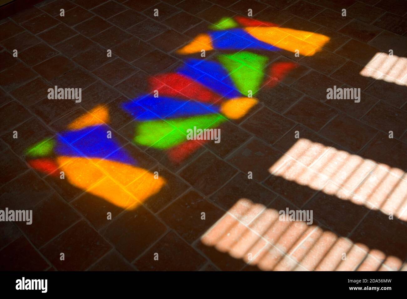 Sunlight through coloured glass window hi-res stock photography and ...