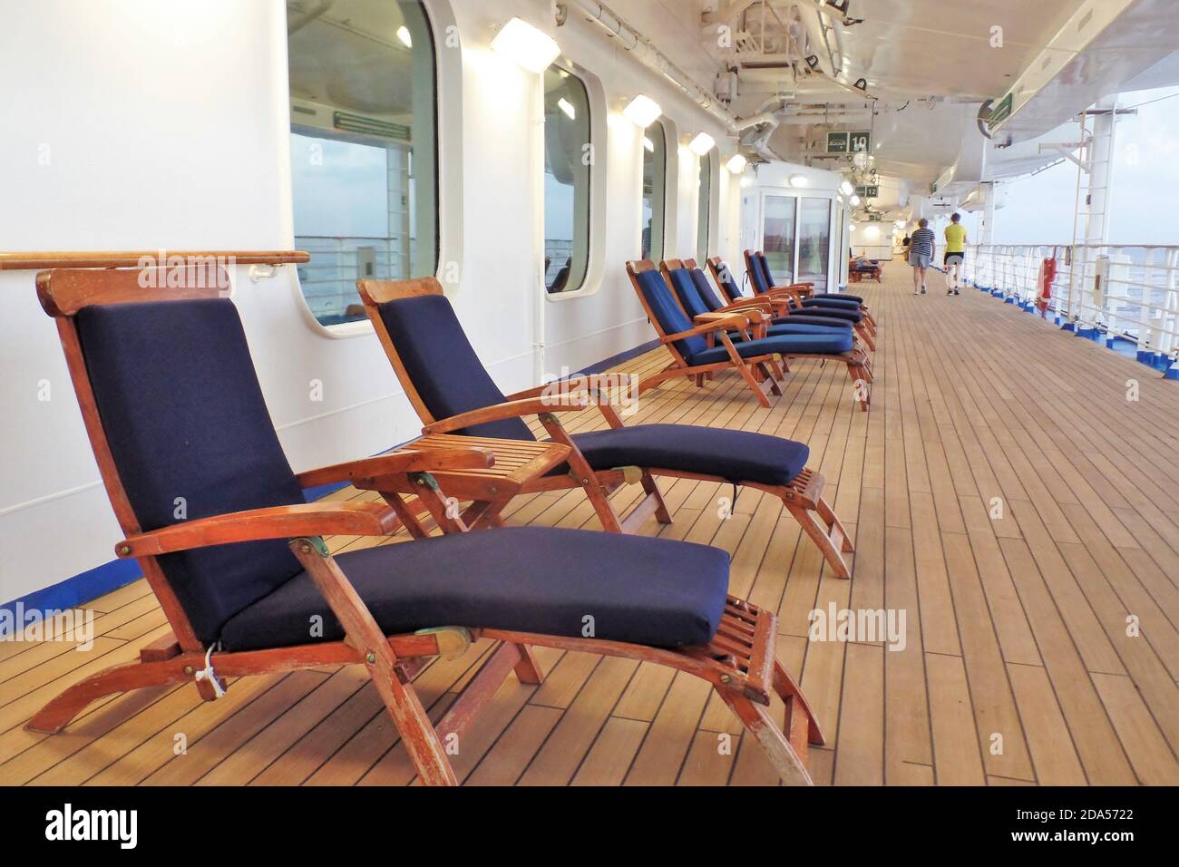 Deck chairs on a cruise ship deck Stock Photo - Alamy