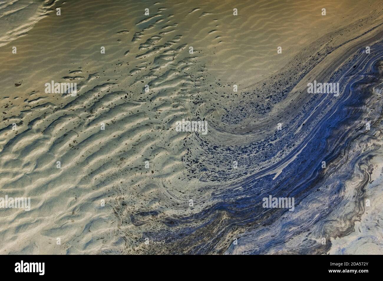 Ocean water and ripple patterns in the sand at low tide Stock Photo - Alamy
