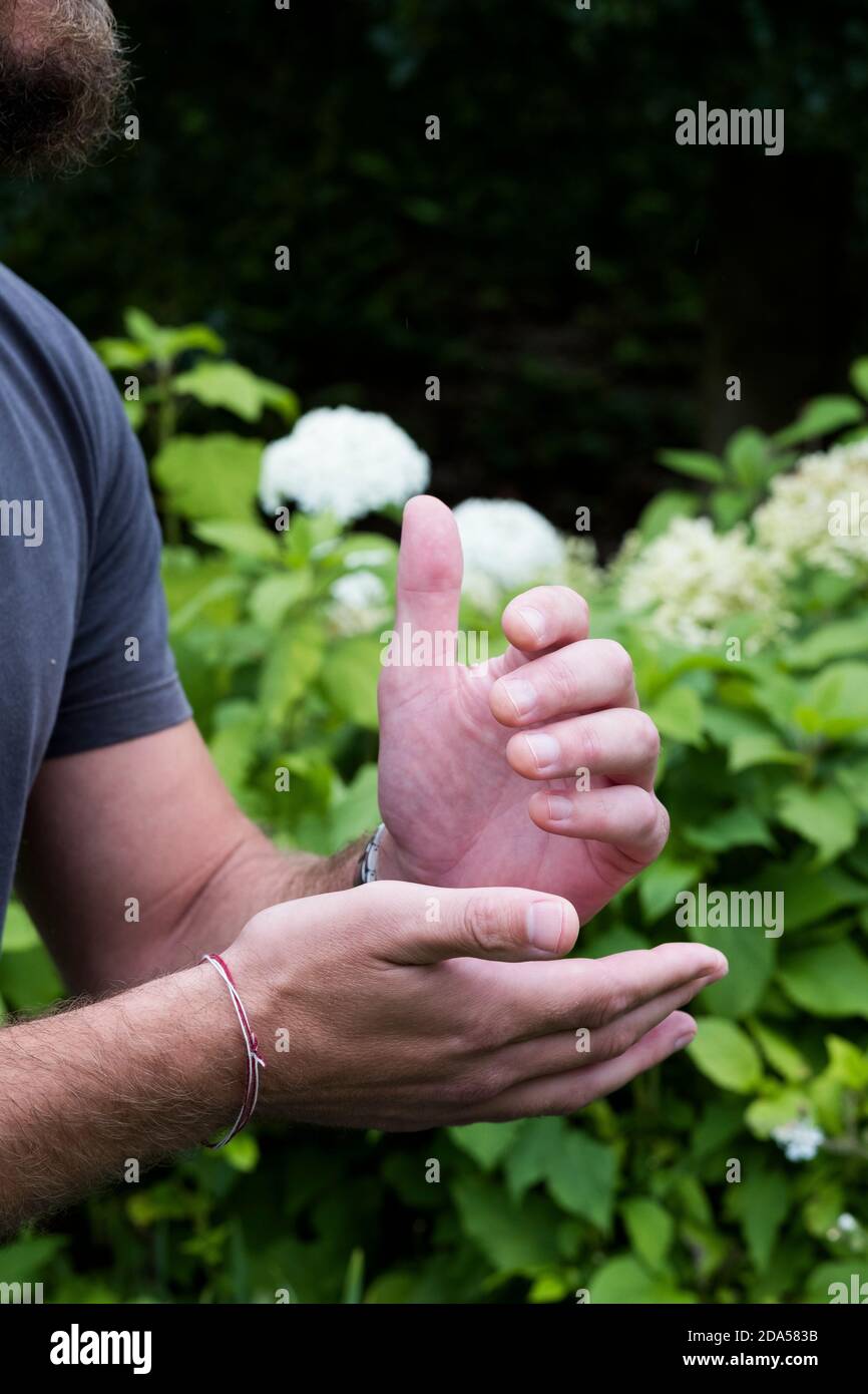 Pressing the hands together hi-res stock photography and images - Alamy