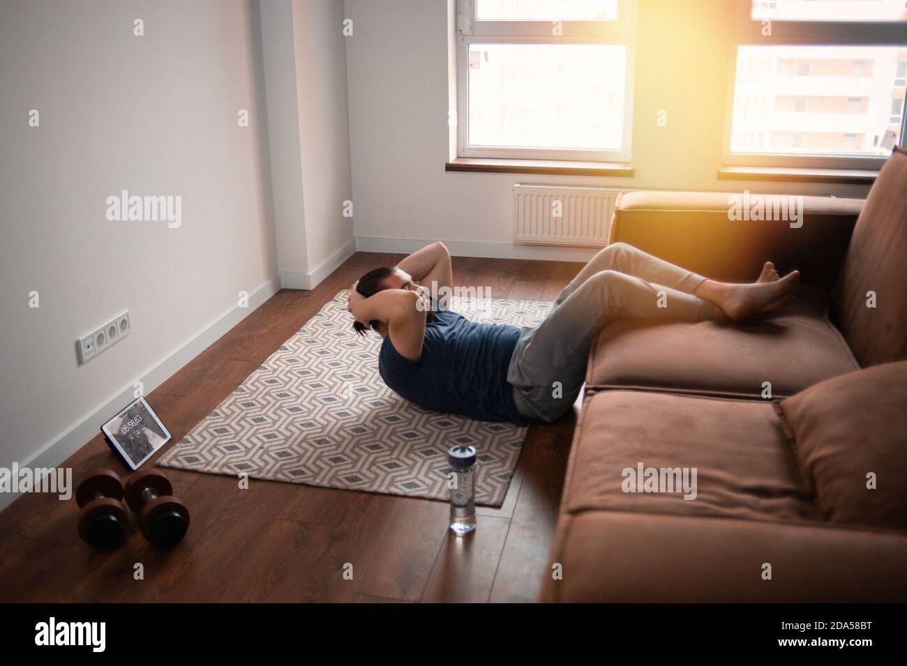 Man working out home hi-res stock photography and images - Alamy