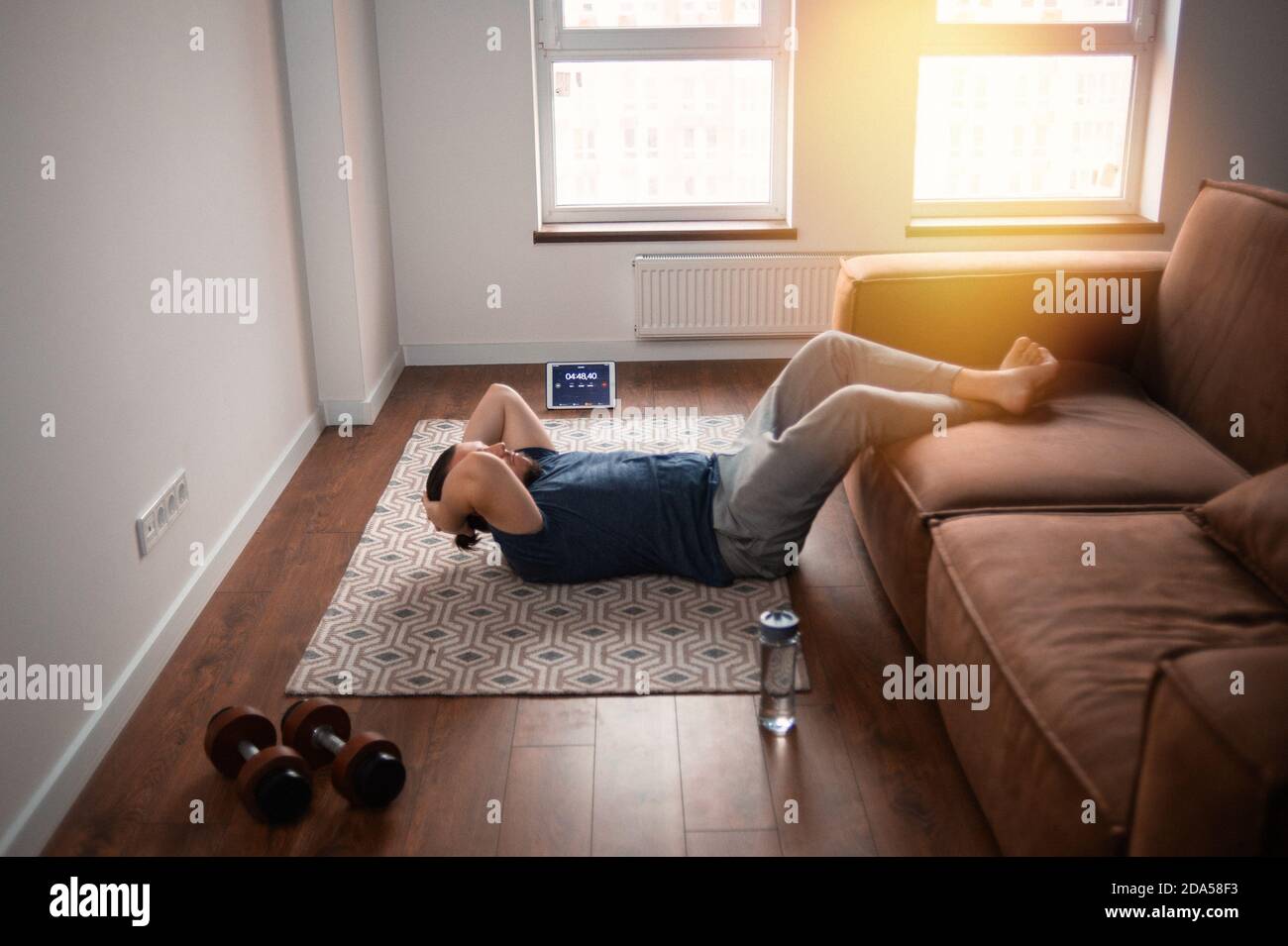 Man home exercise bottle hi-res stock photography and images - Alamy