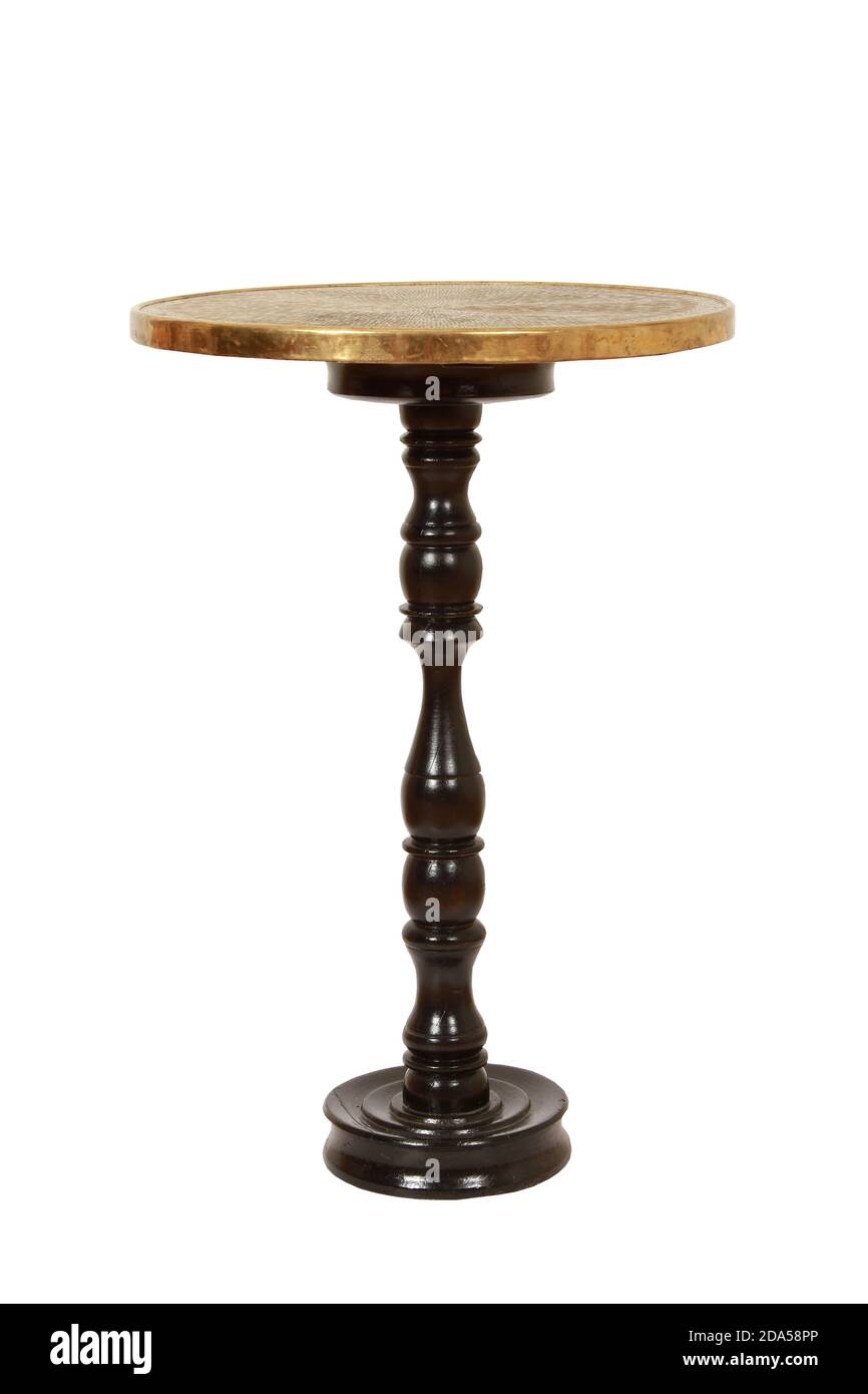 Vertical shot of a vintage wooden round table isolated on white ...