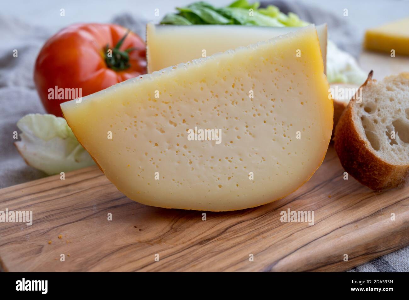 Cheese collection, French fol epi cheese with many little holes and ...