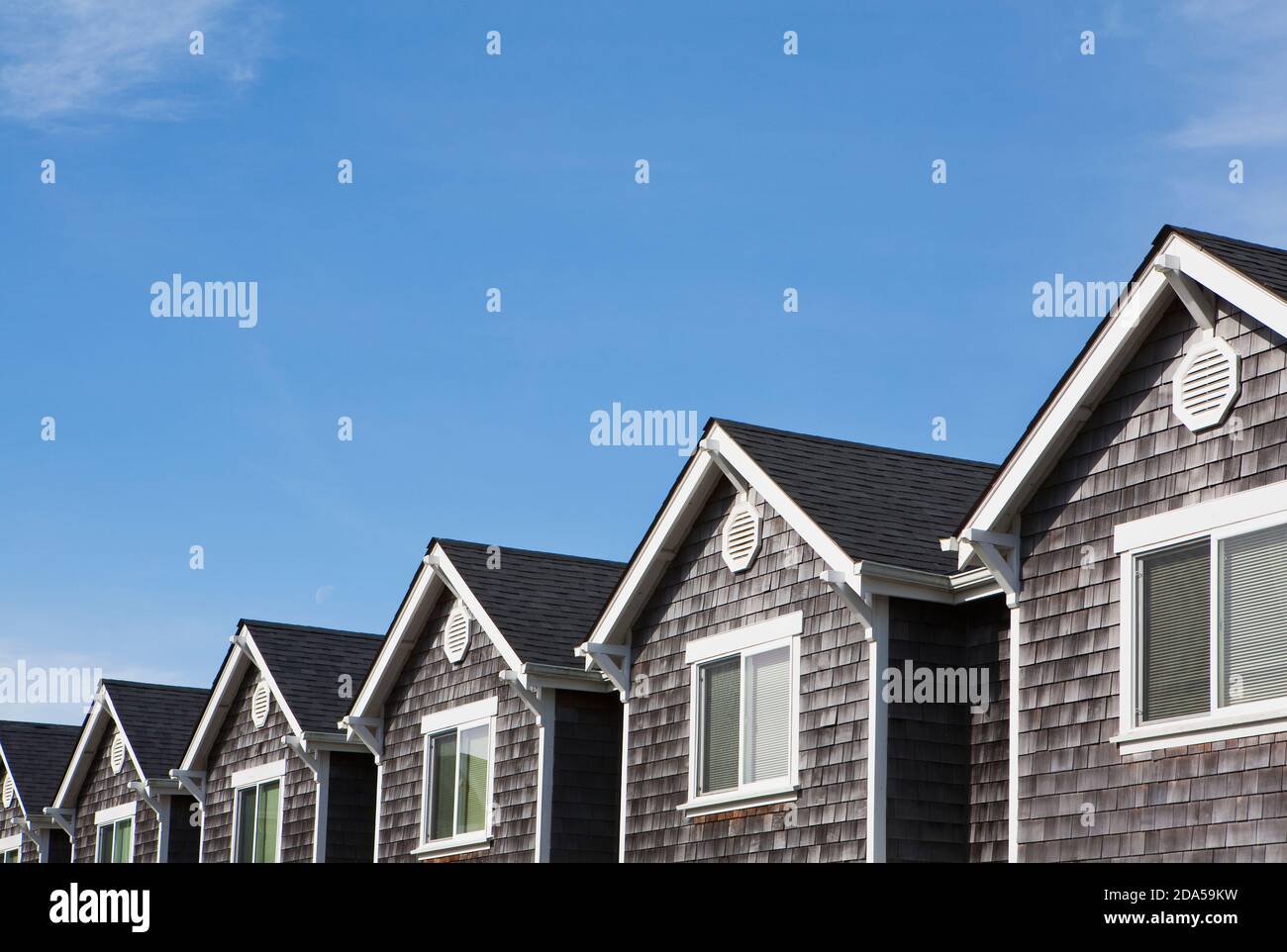 Row of houses, all the same, pitched roof and upstairs window Stock ...