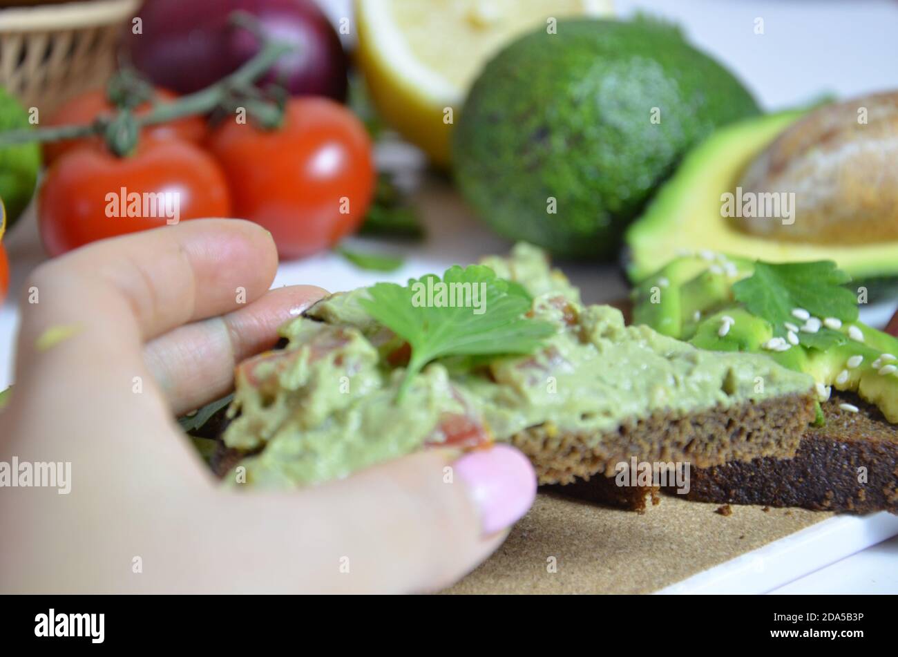 Guacamole and bread. Toast with avocado on white background. Homemade ...