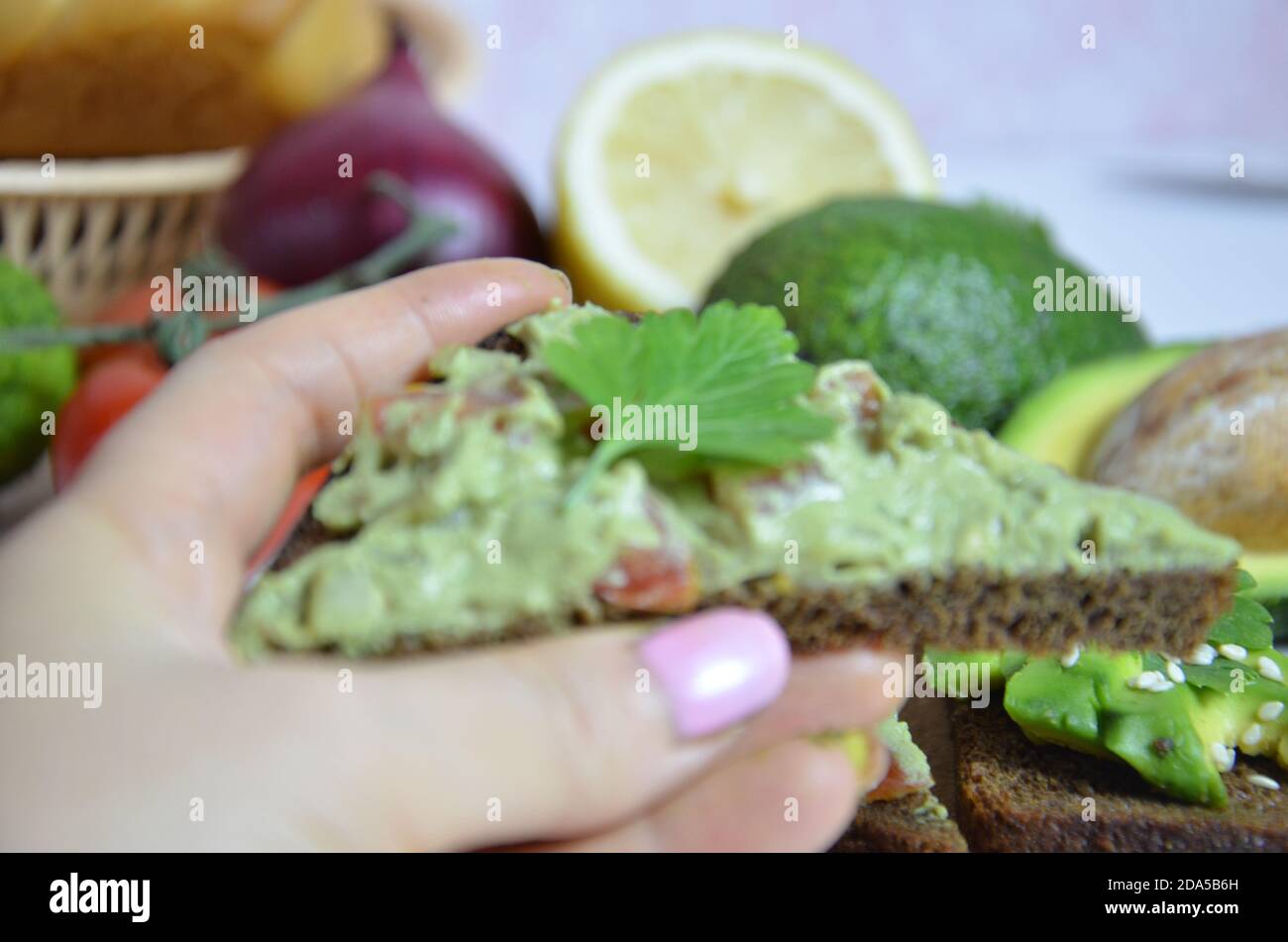 Guacamole and bread. Toast with avocado on white background. Homemade ...