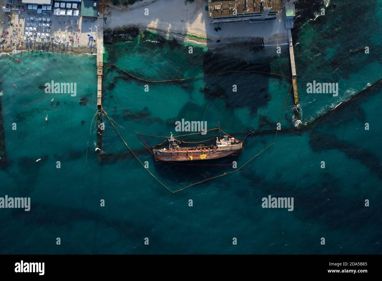 Top view of an old tanker that ran aground and overturned Stock Photo ...