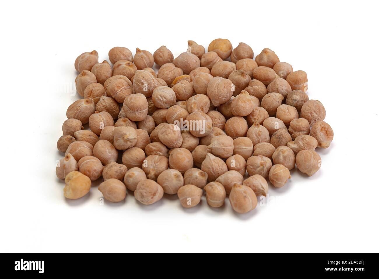 Raw and dry chickpeas on a white background Stock Photo - Alamy