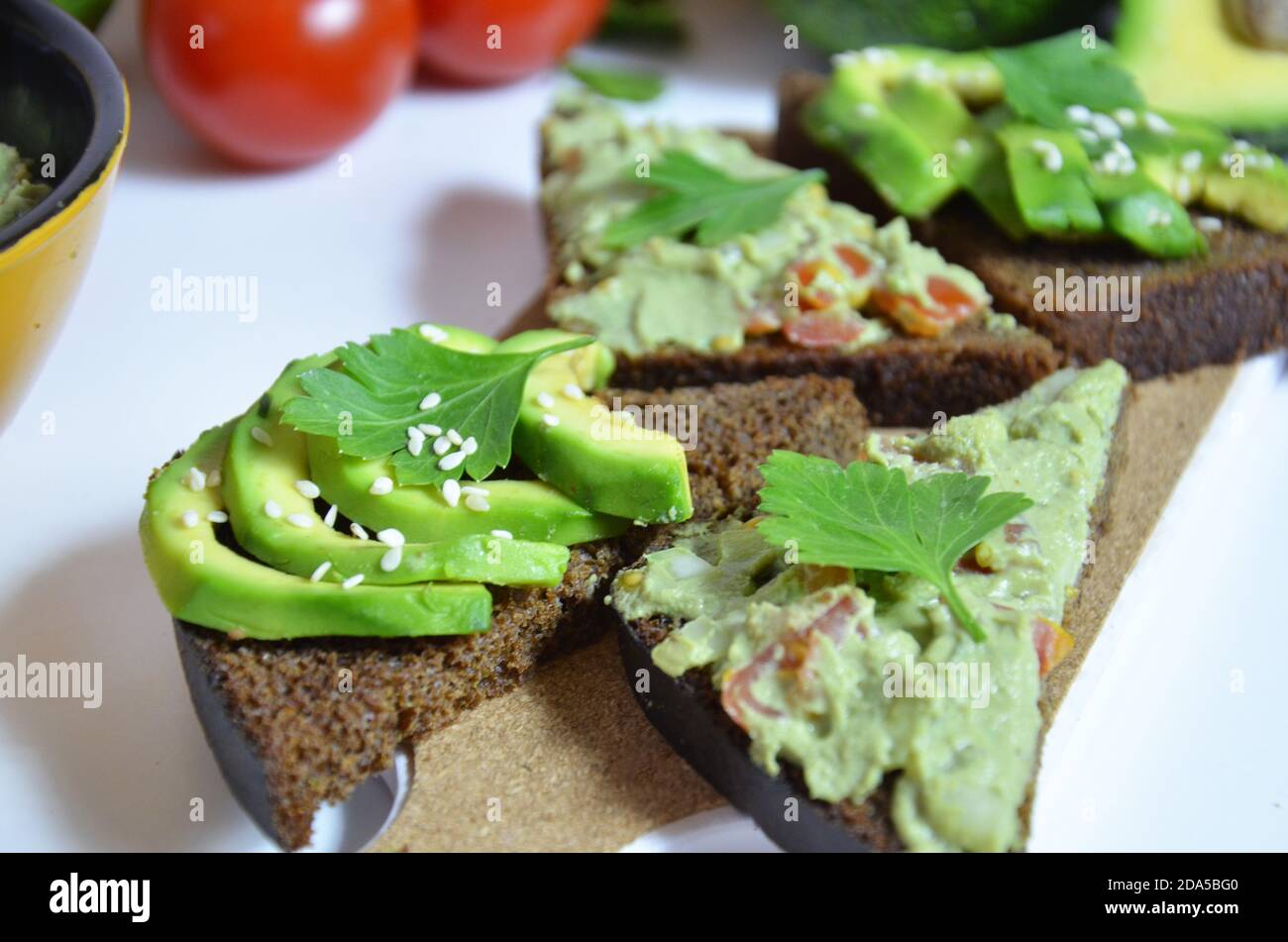 Guacamole and bread. Toast with avocado on white background. Homemade ...