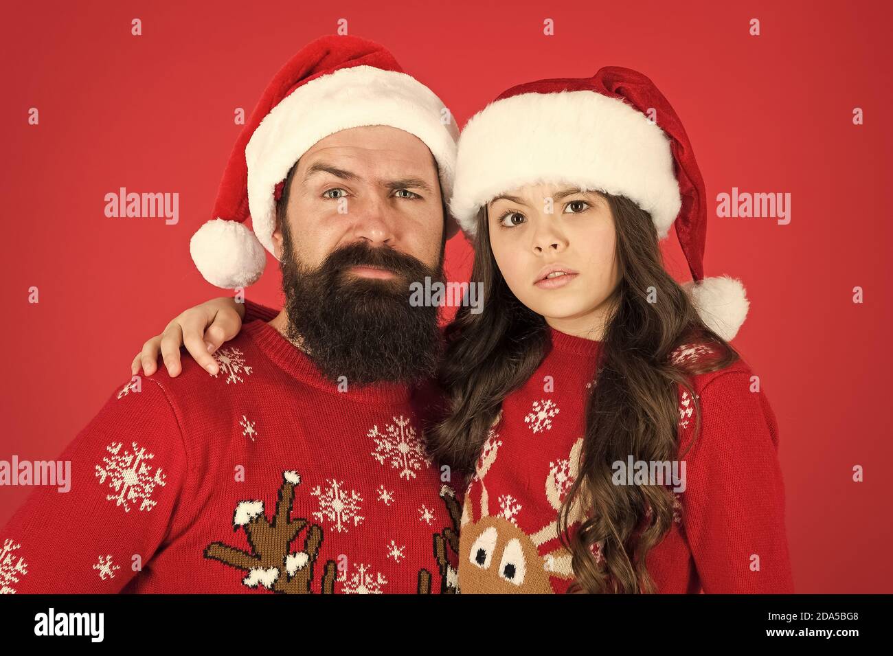 some reason joyless. daddy and kid red background. christmas time. new ...