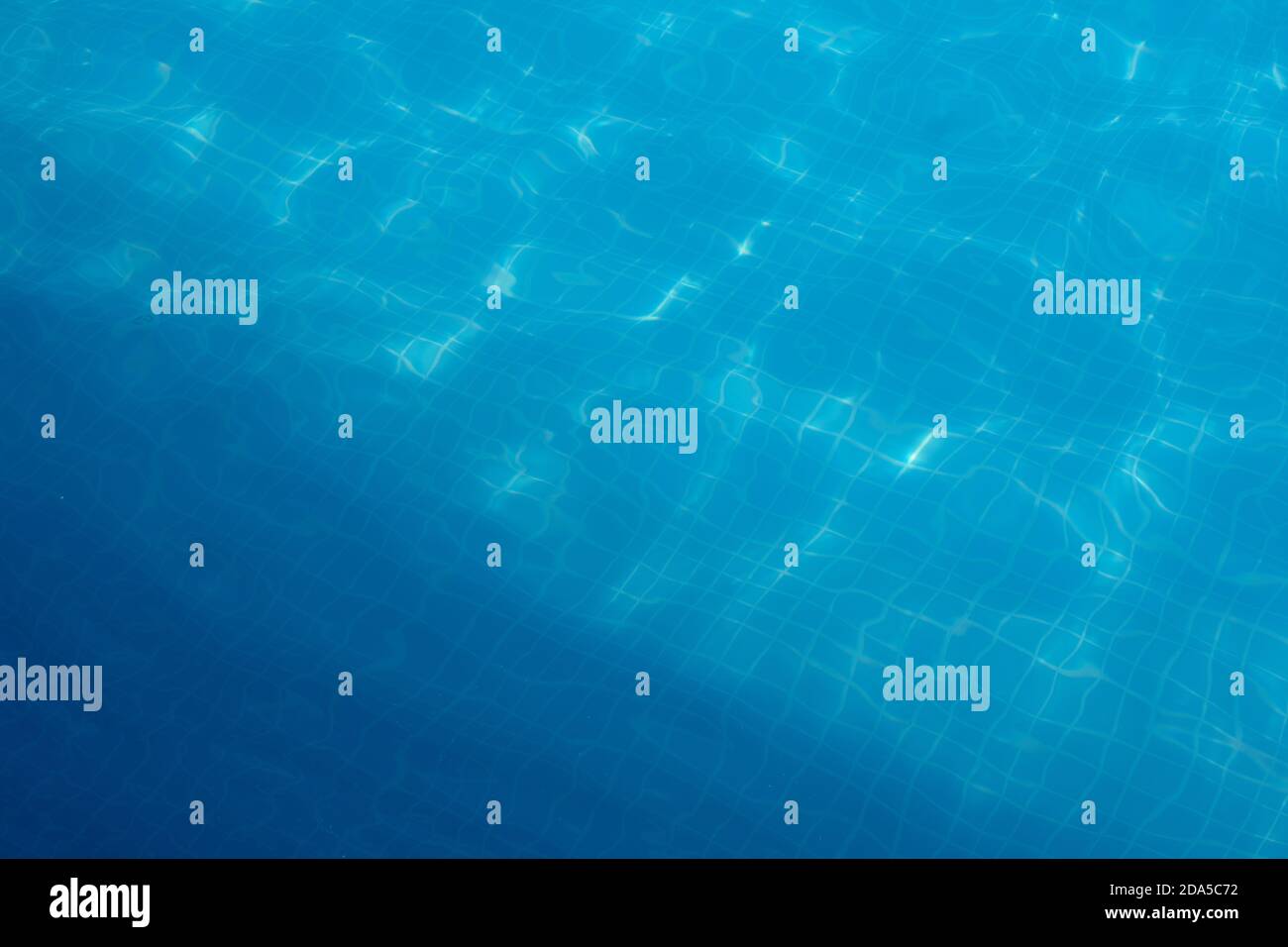 Blue ripped water in swimming pool. Surface of blue swimming pool ...