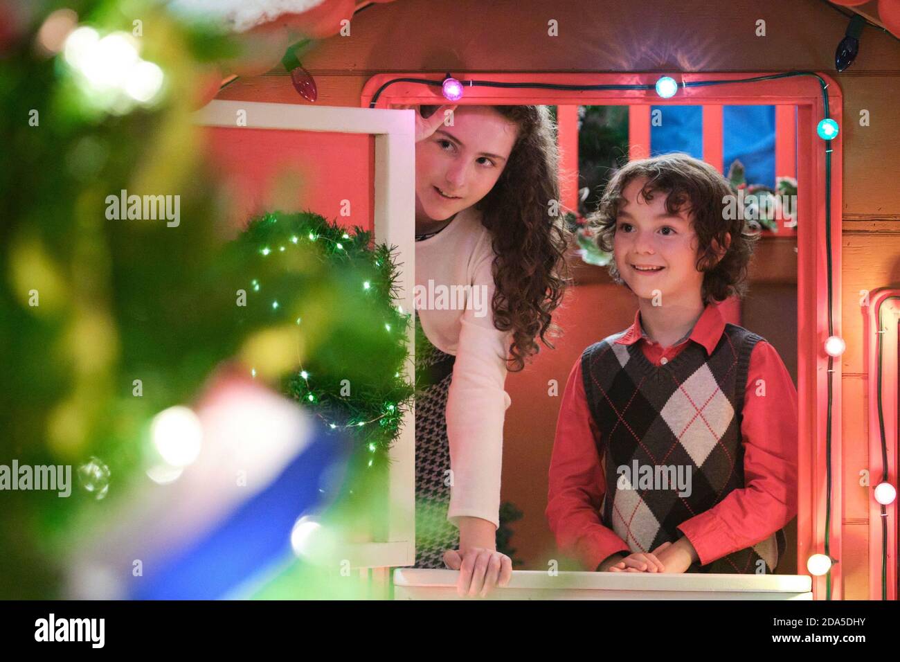 NEVER KISS A MAN IN A CHRISTMAS SWEATER, from left: Parker McLellan ...
