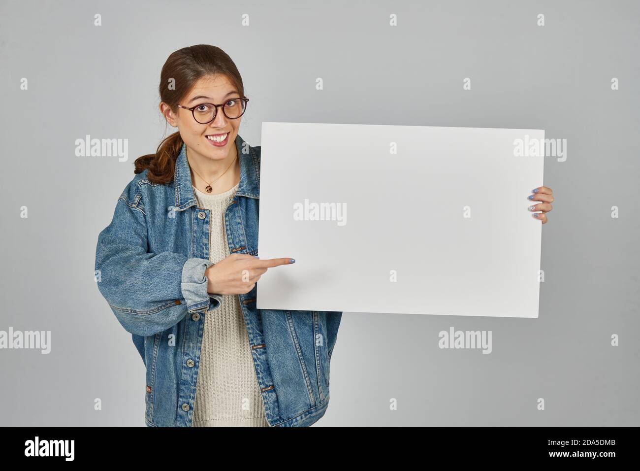 Spanish college student with white poster ready to study Stock Photo ...