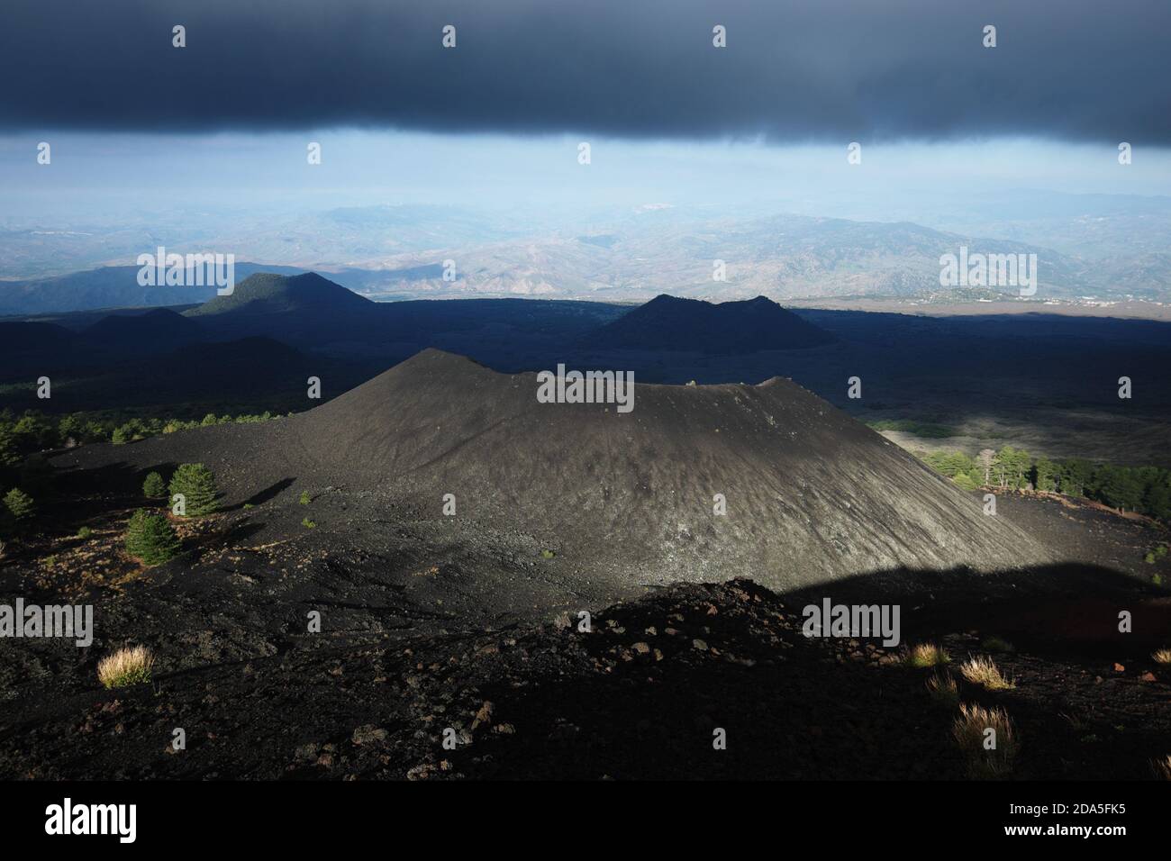 dramatic light on cinder cones in Etna Park Stock Photo - Alamy