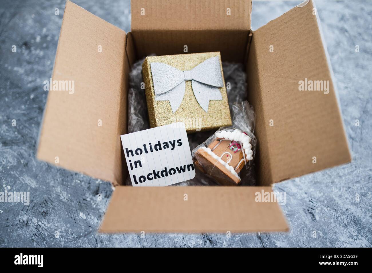 winter holidays in lockdown concept, gifts being delivered via postal ...