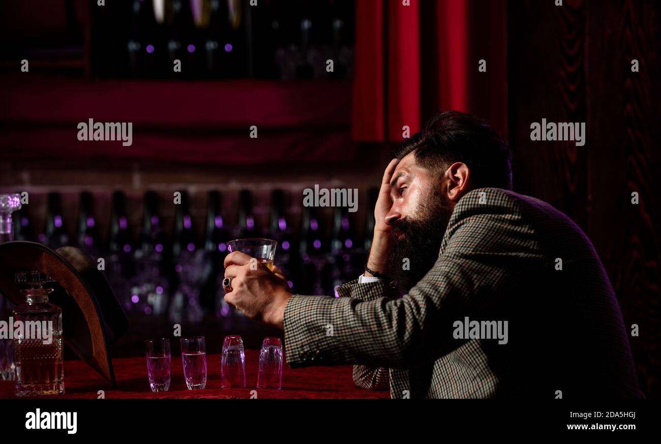 Bearded gentleman drink cognac. Bad habit, alcohol addiction Stock ...