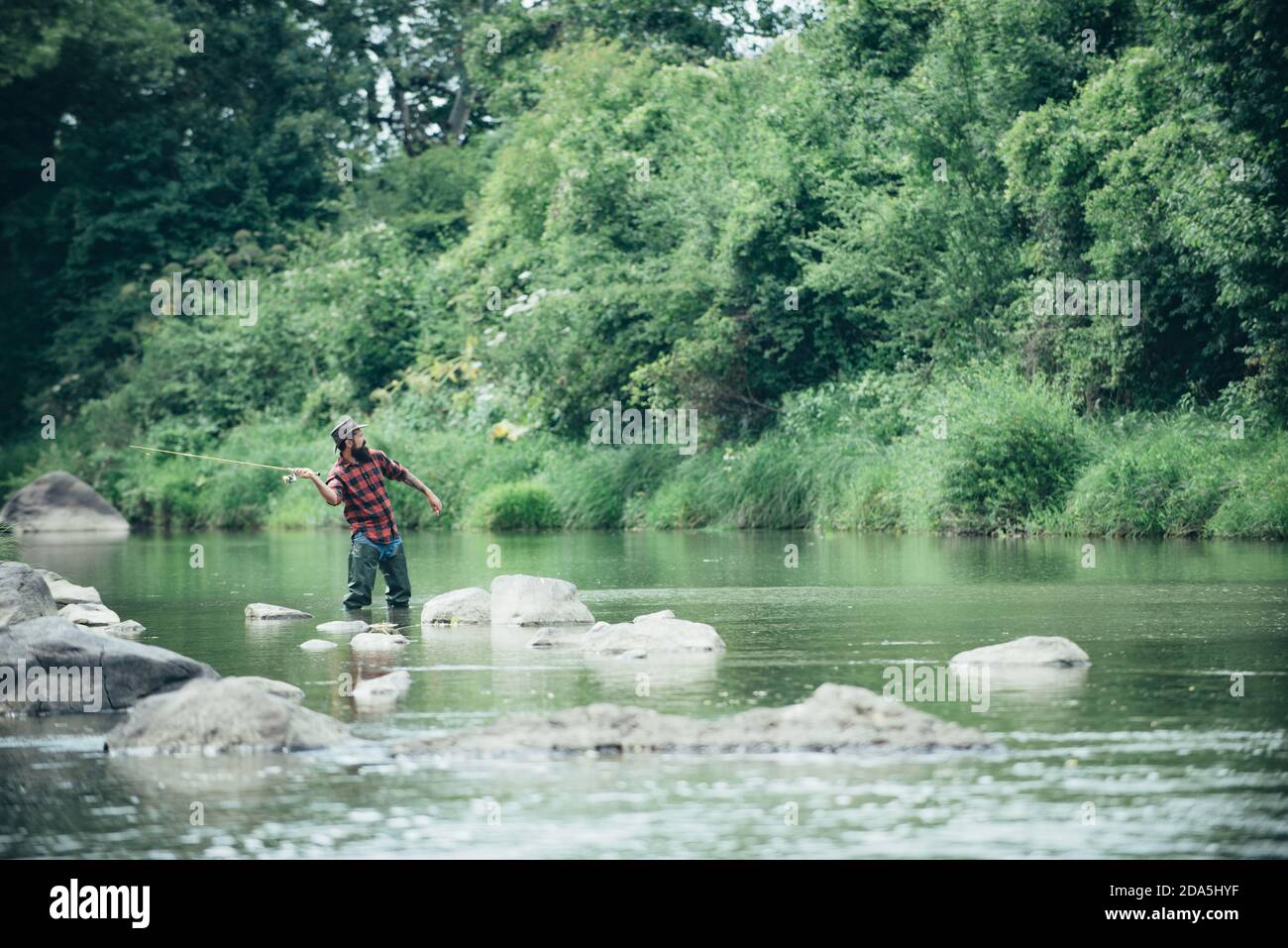 Bearded men catching fish. Male hobby. Guy fly fishing. Man fishing on ...