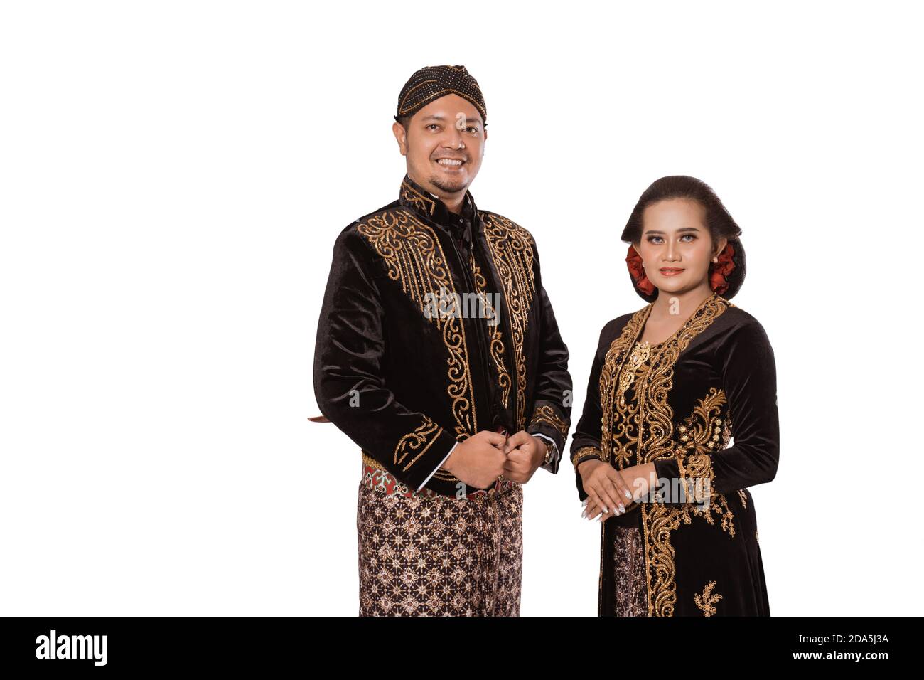 Portrait happy men and women wearing traditional javanese clothes ...