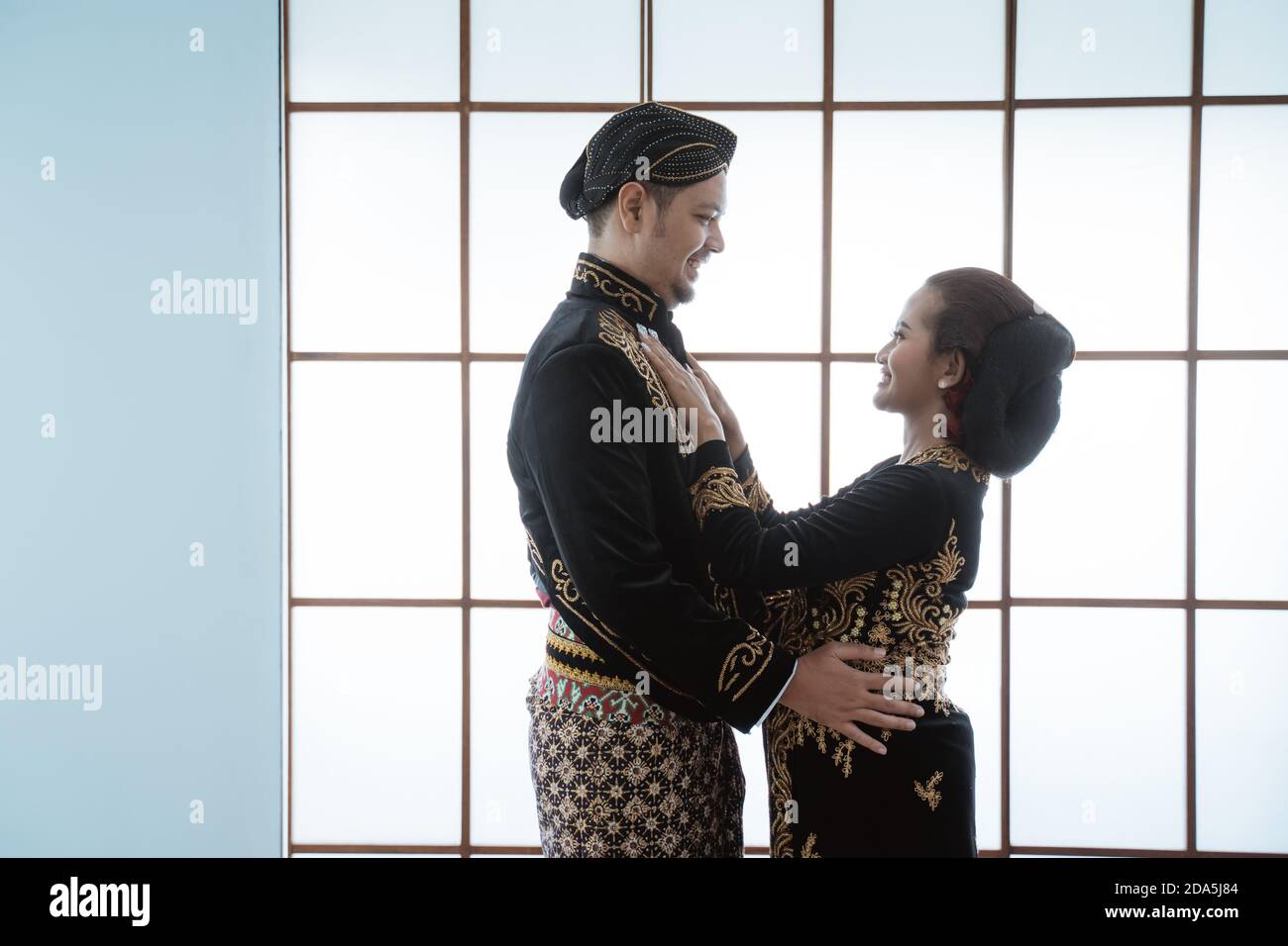 Portrait Happy Men And Women Wearing Javanese Traditional Clothes