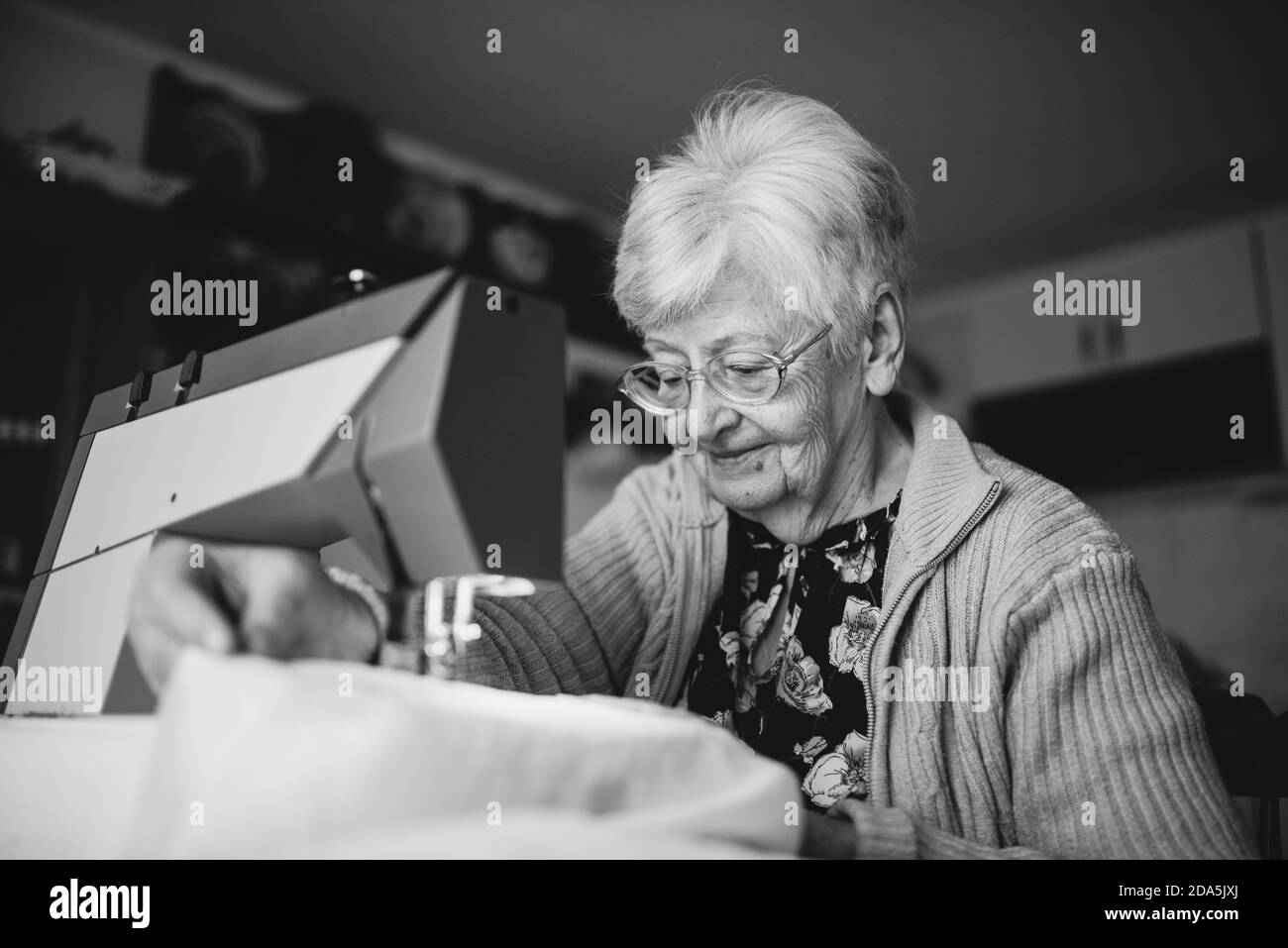 Old age elderly people sewing Black and White Stock Photos & Images - Alamy