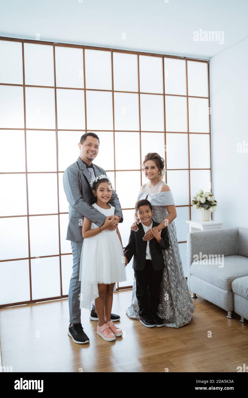 Portrait of a happy family with modern clothes. Family photo concept in ...