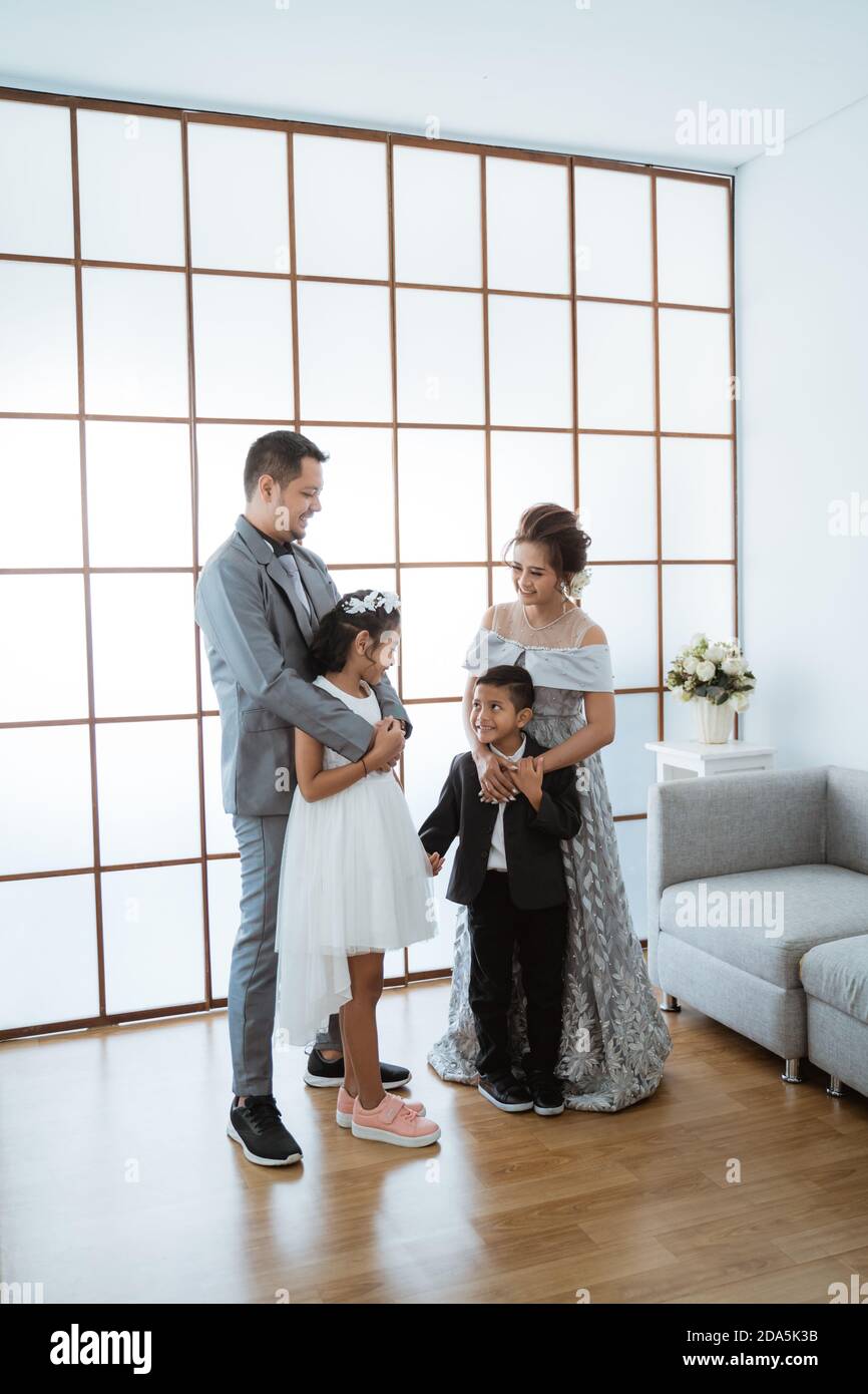 Portrait of a happy family with modern clothes. Family photo concept in ...