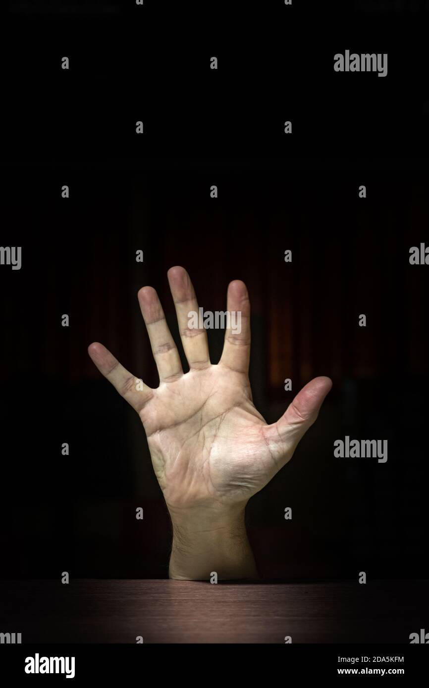 Open hand symbol five against a black background Stock Photo - Alamy