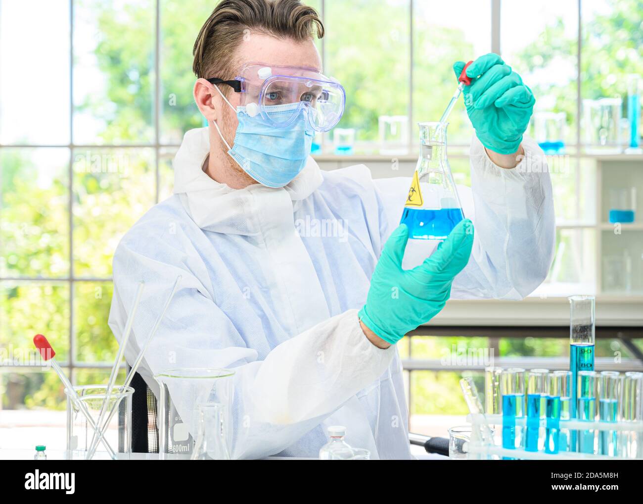 Lab coat beaker hi-res stock photography and images - Alamy