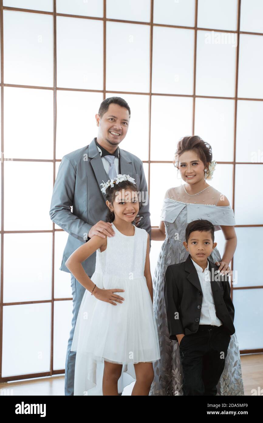Portrait of a happy family with modern clothes. Family photo concept ...