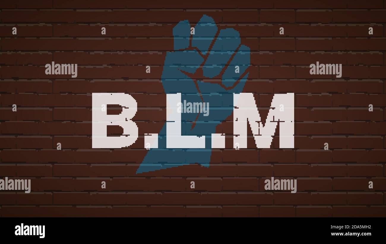 Black Lives Matter. Text on brick wall with white letters and hand ...