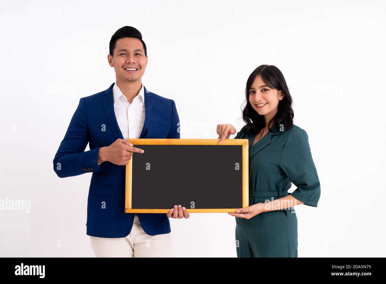 Happy business partner portrait. Showing copy space on the board Stock ...