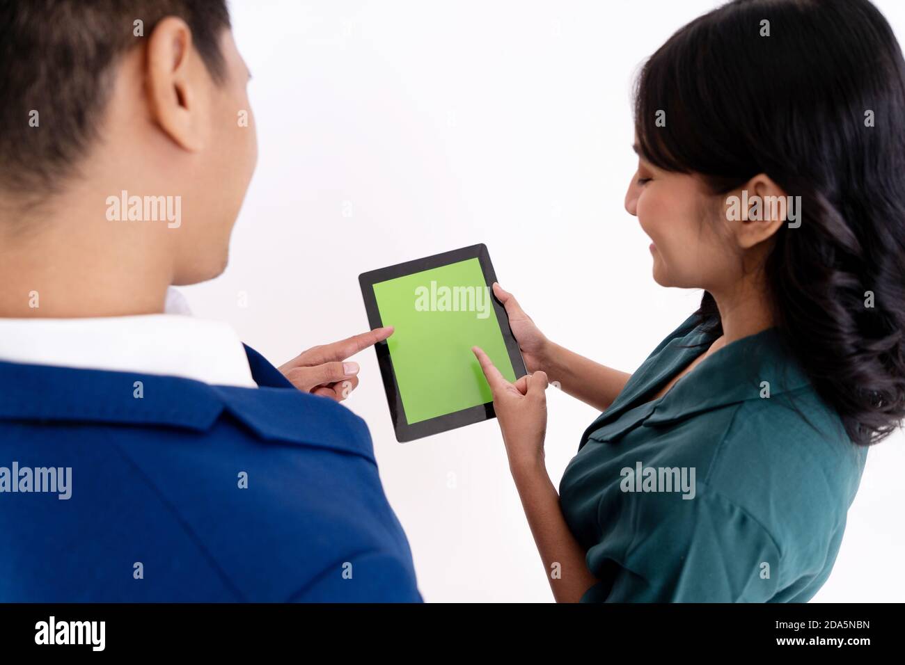 Happy business partner portrait. Showing copy space on the tablets ...