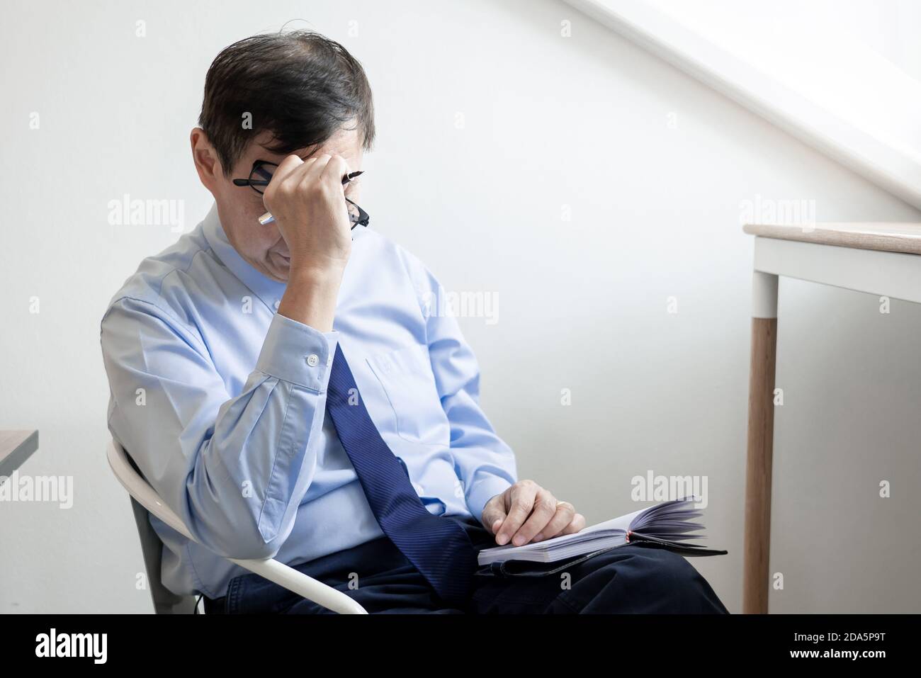 frustrated stressed senior businessman feeling fatigue and headache ...