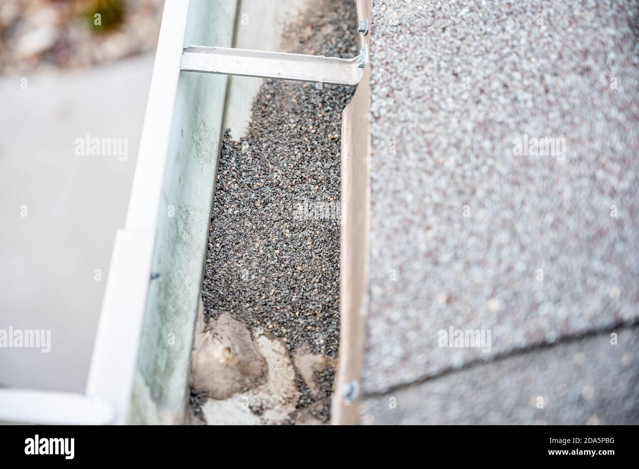 Typical issues and installation of residential rain gutters Stock Photo ...