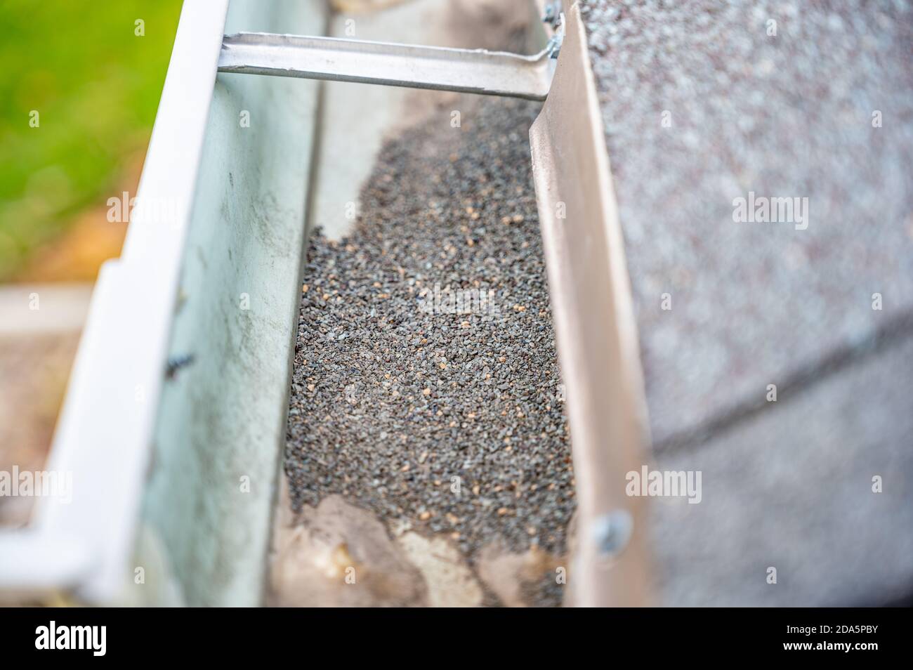 Typical issues and installation of residential rain gutters Stock Photo ...