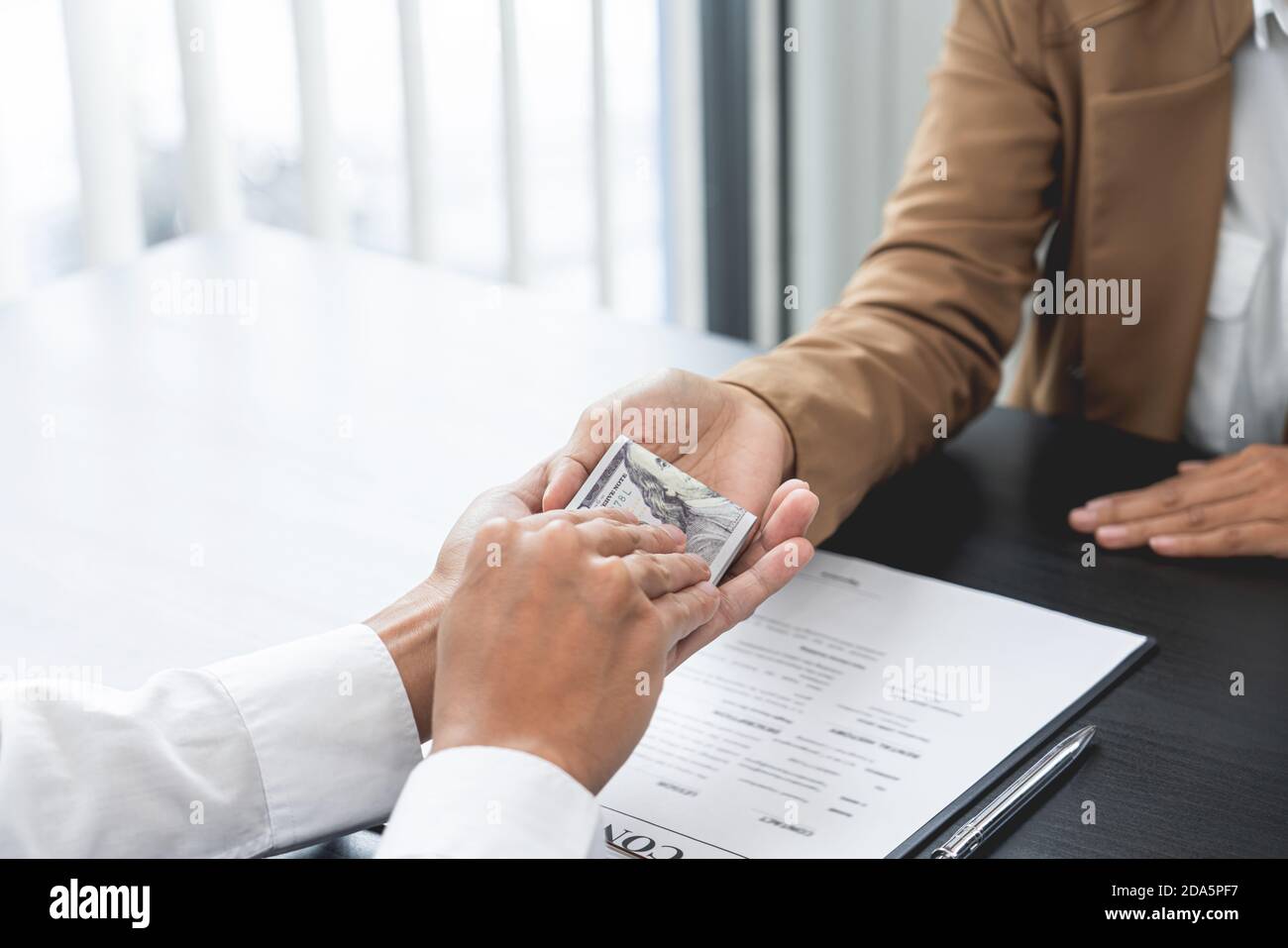 Businessmen give money to bribe partner secretly passing money, bribery ...