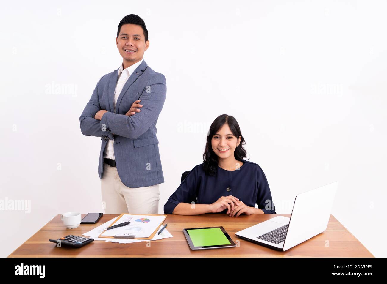 portrait of happy business partner working on modern office desk Stock ...
