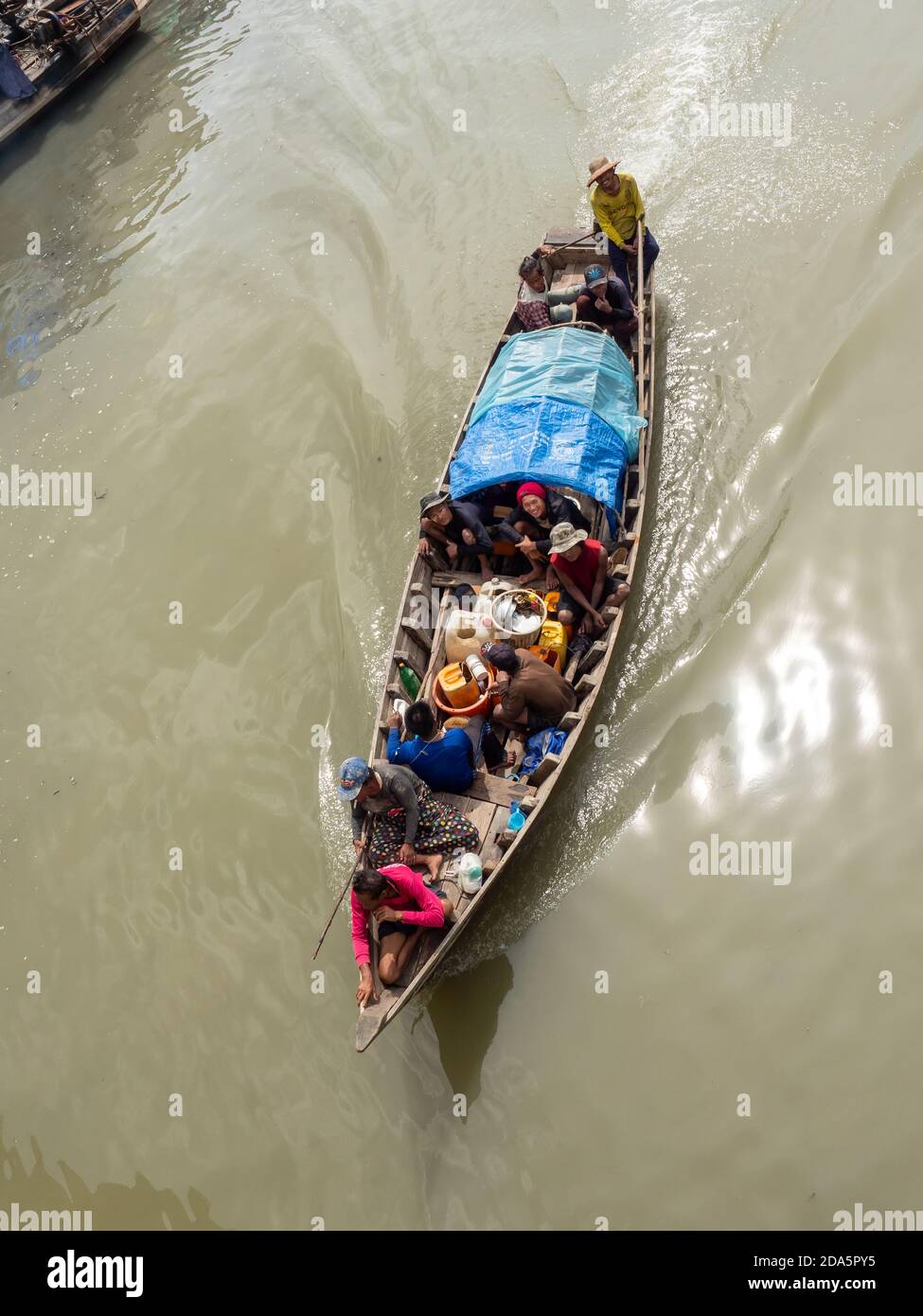 Wooden boats on a canal connected to the Tanintharyi River in Myeik ...