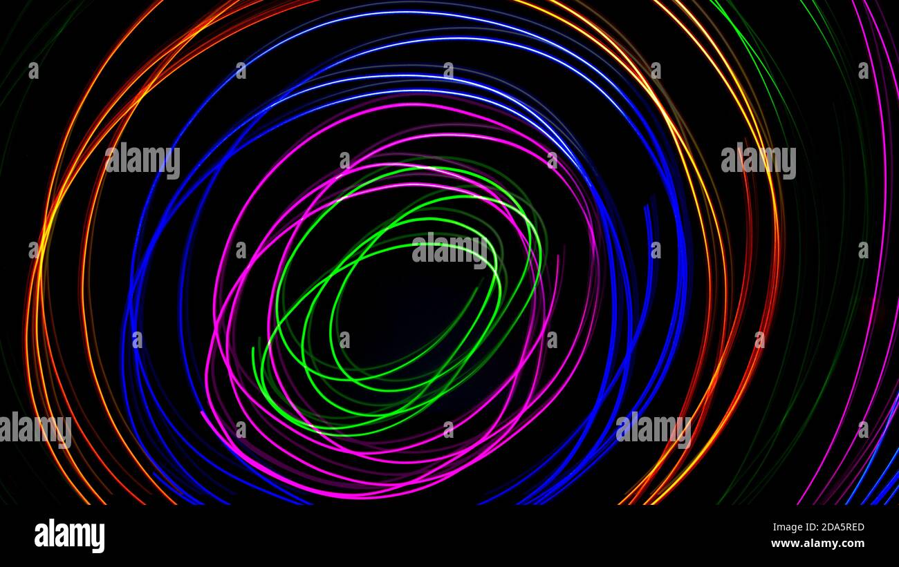 Multi color light painting photography, swirl and curve of blue, green ...