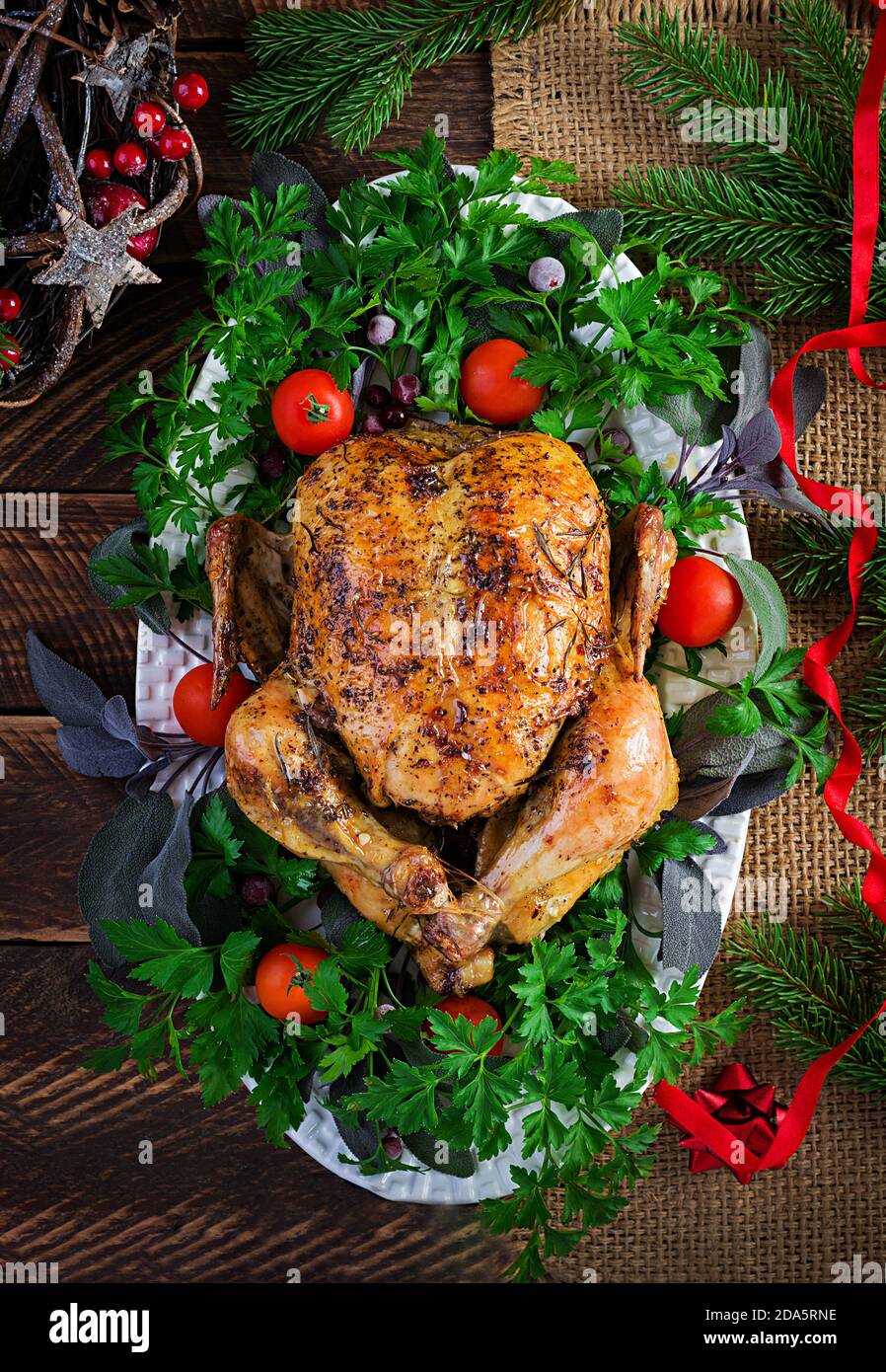 Baked turkey or chicken. The Christmas table is served with a turkey ...