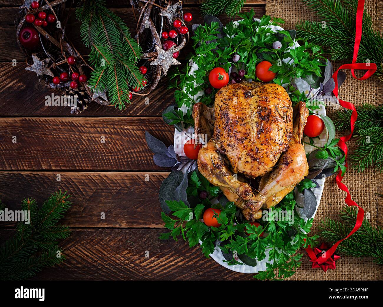 Baked turkey or chicken. The Christmas table is served with a turkey ...