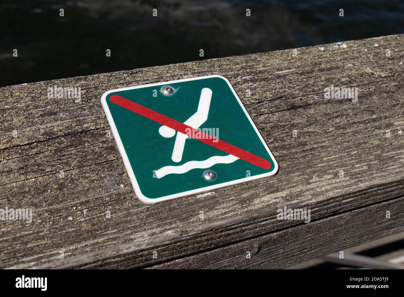 View of sign "No diving" on a pier in Belcarra Regional Park Stock ...