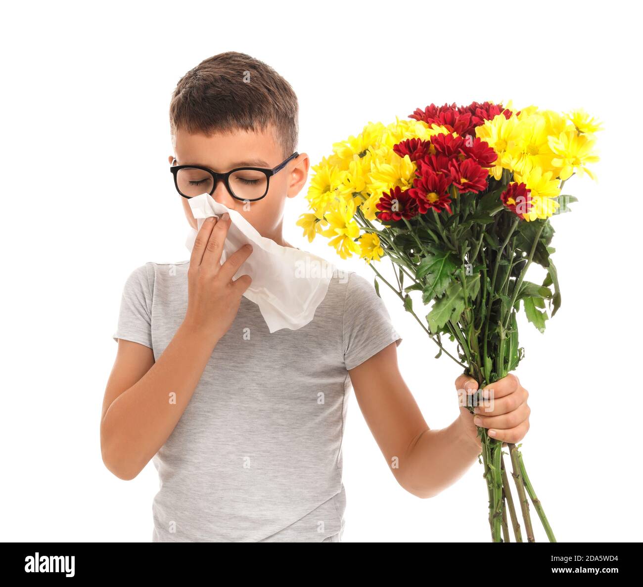 Allergic boy with flowers on white background Stock Photo - Alamy