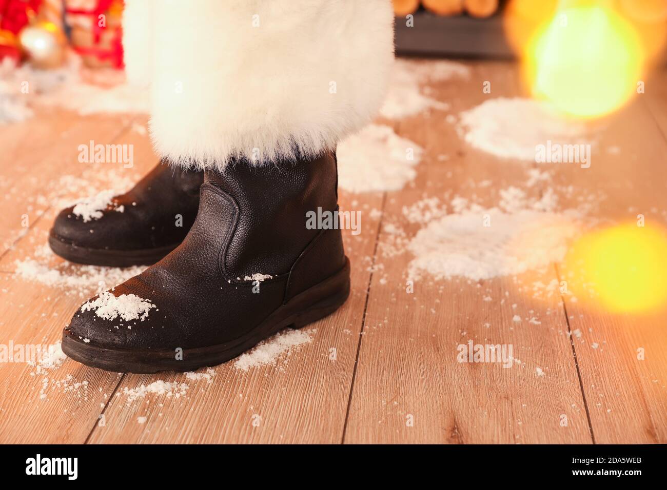 Feet of Santa and his snow footprints on floor in room Stock Photo - Alamy