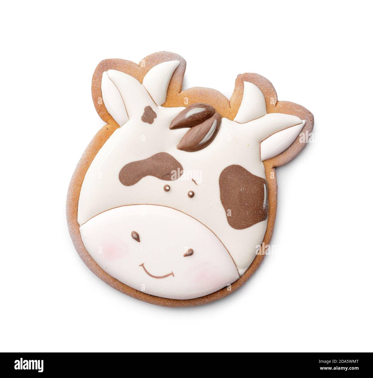 Tasty Christmas cookie in shape of bull on white background Stock Photo ...