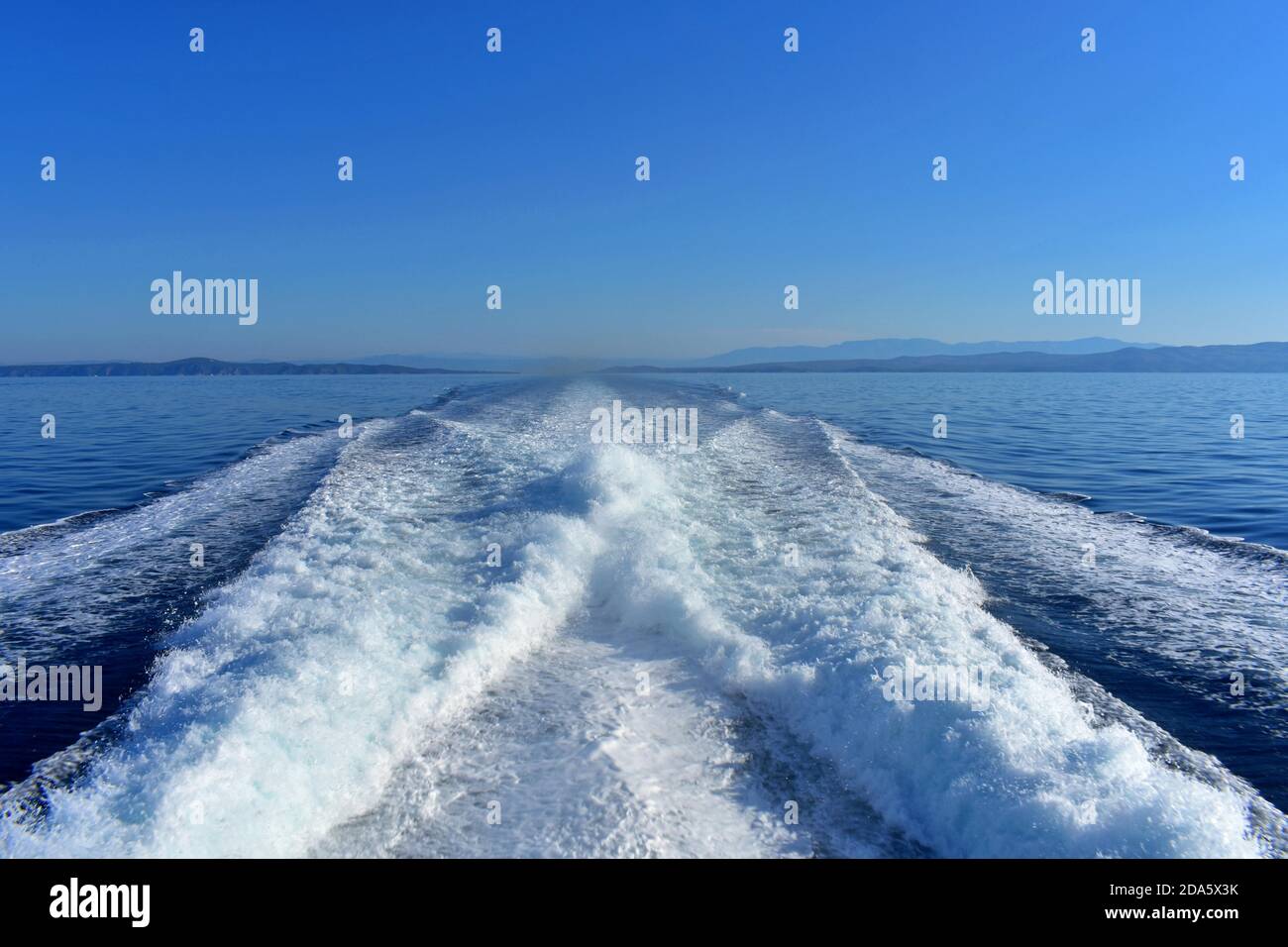 Sea view behind ferry/ Wave of a boat over the beautiful water of ...