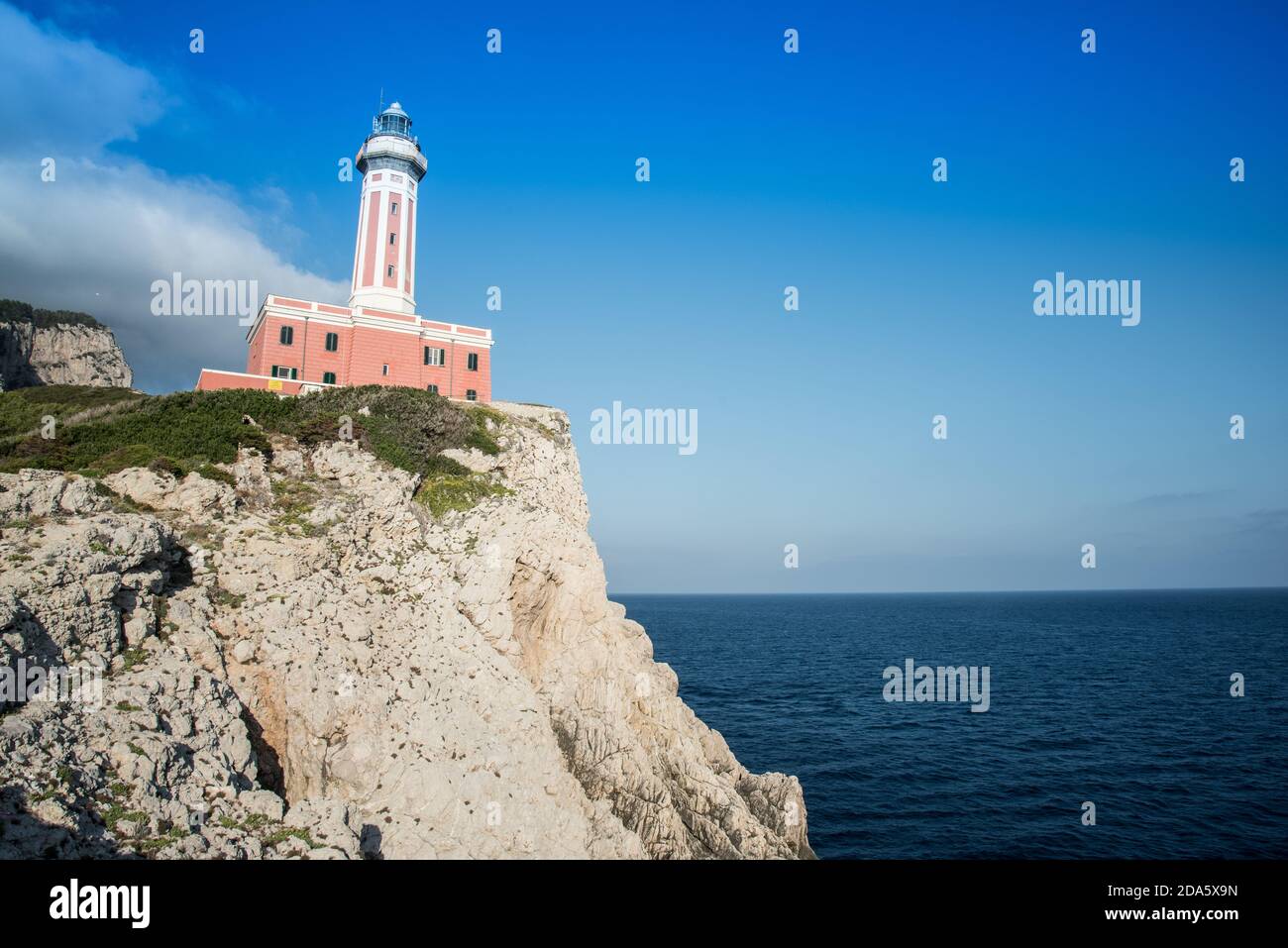 Seascape with a lighthouse on the coast and the sea. Capri island Stock ...