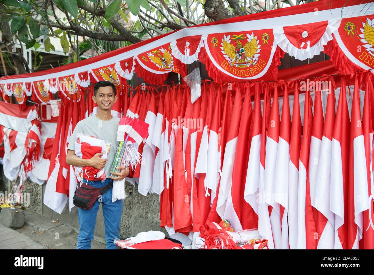 portrait of a young man selling the Indonesian national flag Stock ...