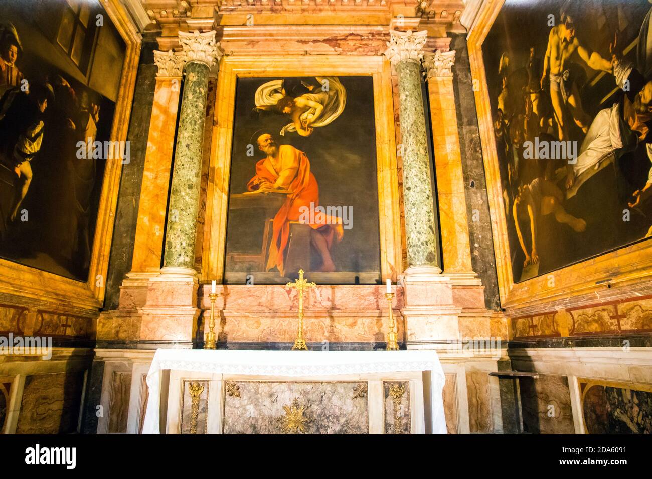 Caravaggio's painting The Inspiration of Saint Matthew hanging in the ...